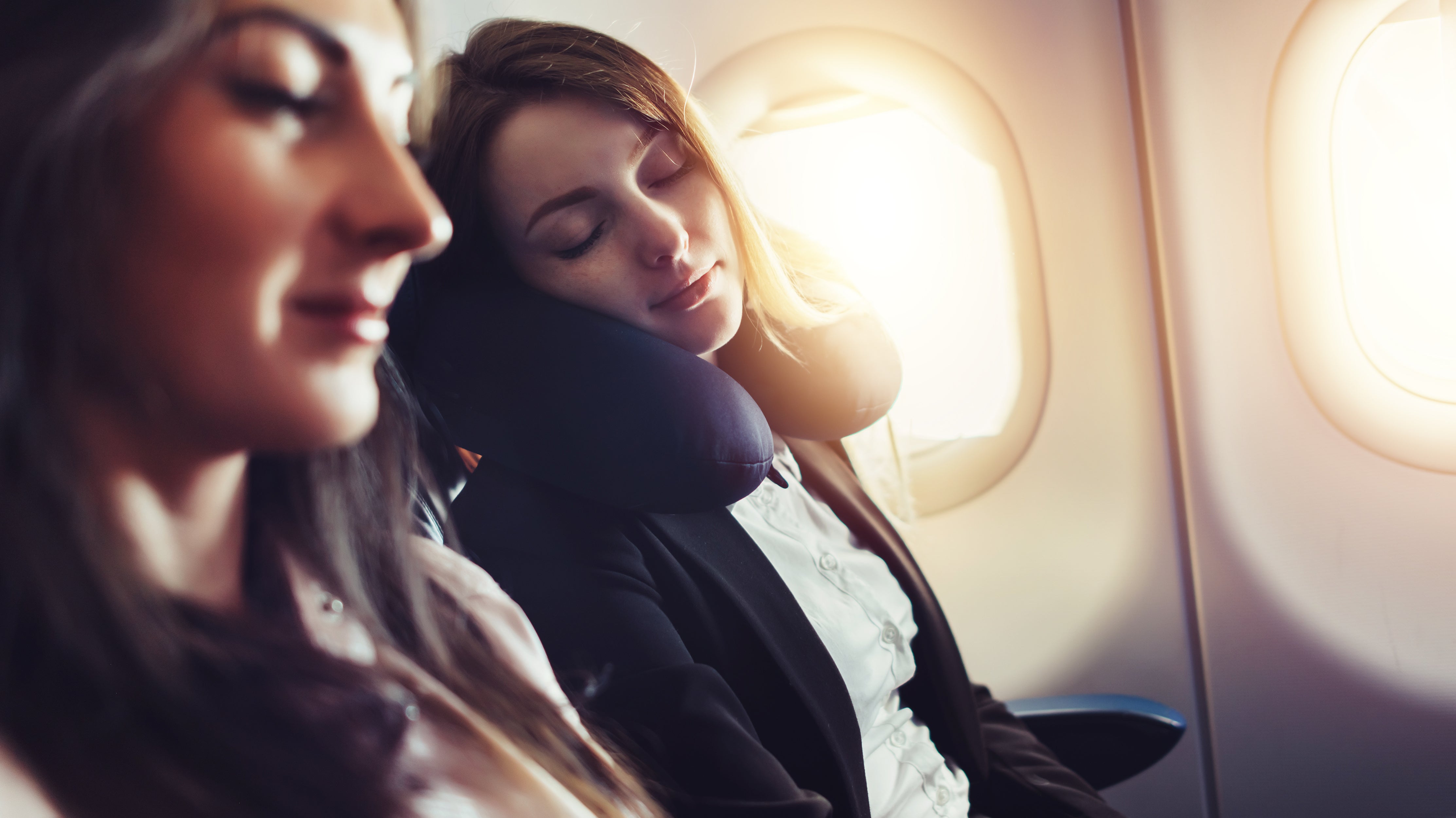 The Ultimate Guide to Airplane Etiquette (Who Gets the Armrest?)